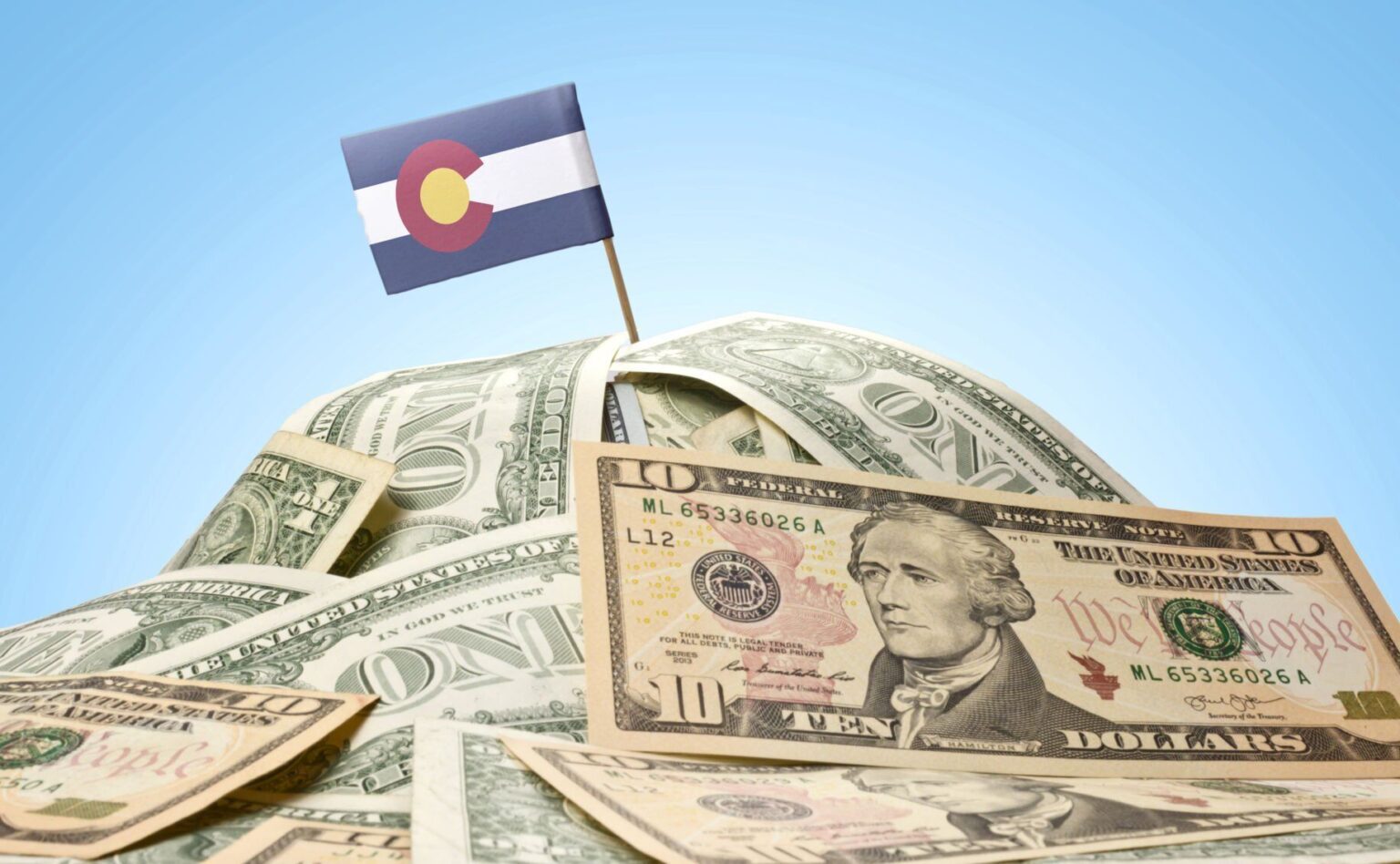 Gov. Jared Polis announces $252.5 million in cuts to Colorado state ...